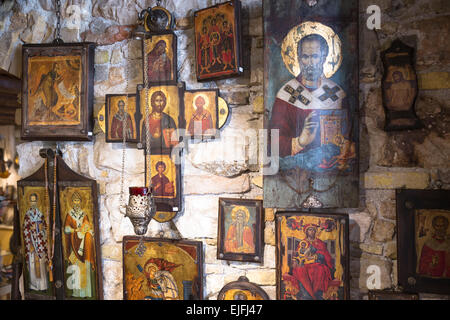 Display of Greek souvenirs religious icons on rack in downtown shopping ...