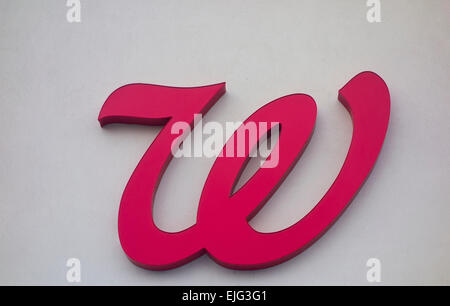A logo sign outside of a Walgreens Pharmacy store location in Richmond ...