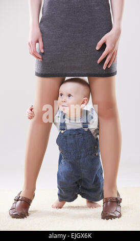 baby between the legs of mom Stock Photo - Alamy