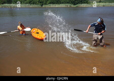 Naked woman in splashed water Stock Photo - Alamy