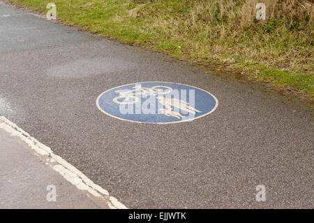 Tarka Trail cycle lane sign and symbols in Fremington, Devon, England ...