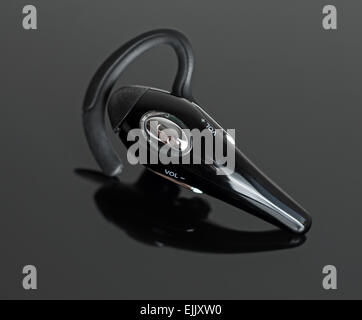 Close-up of mobile handsfree bluetooth device Stock Photo - Alamy