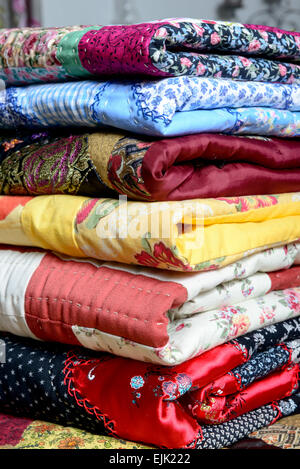 different colored patchwork stacked on a table Stock Photo - Alamy