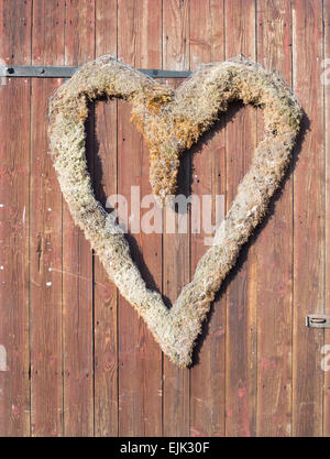 Decorative heart in rustic style, notepad, lights on a white background ...
