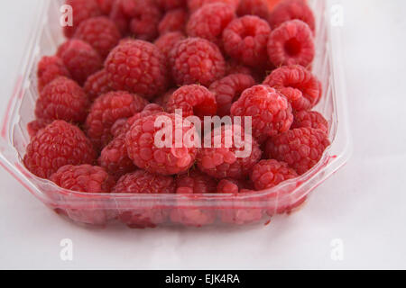 Fresh raspberries isolated over white background Stock Photo - Alamy