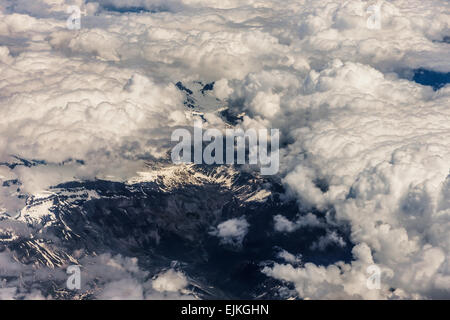 Above aerial plane view of Italian alps and cloudscape Stock Photo - Alamy