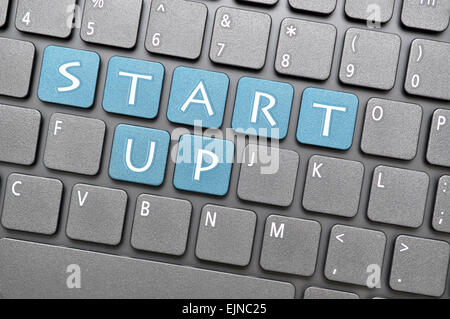 Keyboard blue key Start . business concept Stock Photo - Alamy