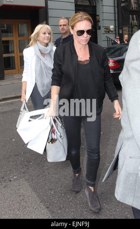 Victoria Beckham's family leaving her new store on Dover Street ...