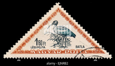 HUNGARY - CIRCA 1952: Stamp with triangle shape printed in Hungary ...