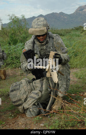 A Tactical Unattended Ground Sensor (T-UGS) unit is deployed to detect ...