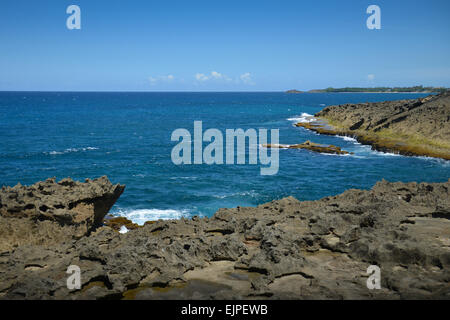 Natural pool and rock formations at Punta Palmas Altas. Barceloneta ...