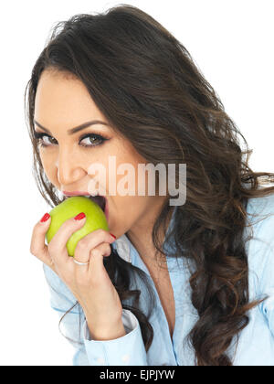 Pretty young woman eating apple Stock Photo - Alamy