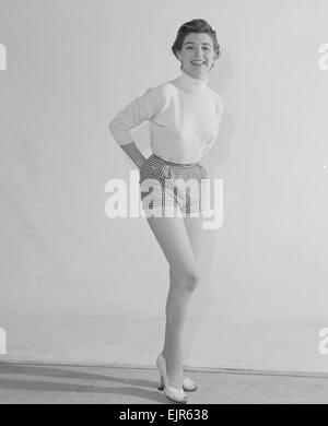 Model Vicki Martin seen here modelling a turtle neck jumper and shorts ...