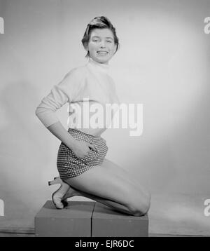 Model Vicki Martin seen here modelling a turtle neck jumper and shorts ...