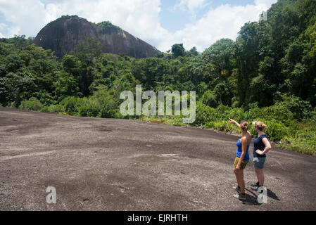 Hikers on Voltzberg Mountain, Central Suriname Nature Reserve, Suriname ...