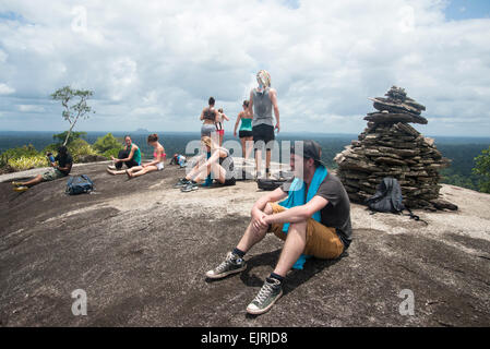 Hikers on Voltzberg Mountain, Central Suriname Nature Reserve, Suriname ...