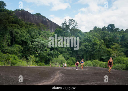 Hikers on Voltzberg Mountain, Central Suriname Nature Reserve, Suriname ...