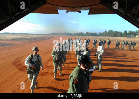 US Army paratrooper soldiers parachute during an airdrop exercise April ...