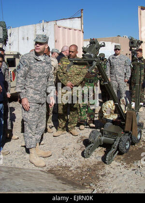 U.S. Army Brig. Gen. Jeffrey Smiley, center, the joint staff director ...