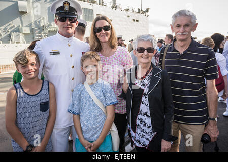 Sydney, AUSTRALIA - April 01, 2015: Officers and crew line the decks of ...