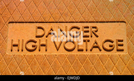Metal manhole cover, Danger Electricity Stock Photo - Alamy
