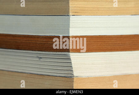 macro image of paper book pages up close. abstract image with bookmark ...