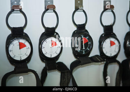 Several altimeters used for skydiving ready to use, amd helmets Stock ...