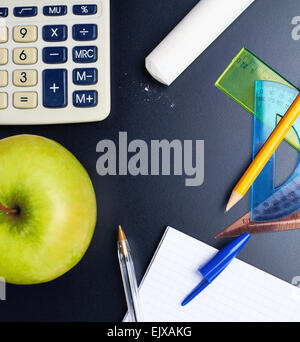 School notebook and pencil on red background, back to school concept ...