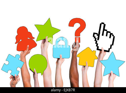 Diverse Hands Holding Various Symbols Stock Photo - Alamy