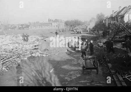 WW2 Air Raid V2 Bomb Damage July 1944 Rescue workers use flood lights ...