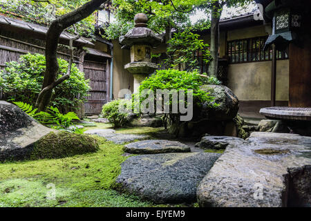 View of a traditional Japanese courtyard 'tsubo-niwa' garden with old ...