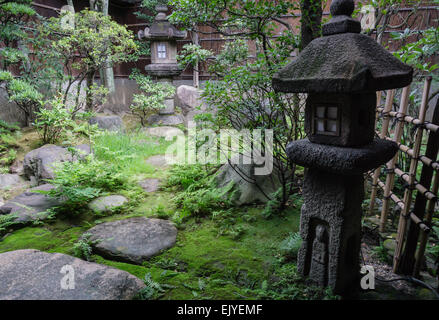 View of a traditional Japanese courtyard 'tsubo-niwa' garden with old ...