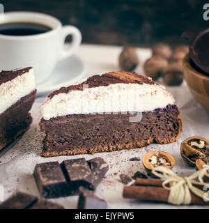 close up of a cup of coffee with whipped cream and chocolate chips ...