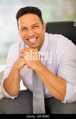Aged businessman employee sitting at workplace Stock Photo - Alamy