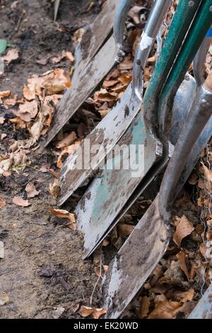 spades soil mud Stock Photo - Alamy