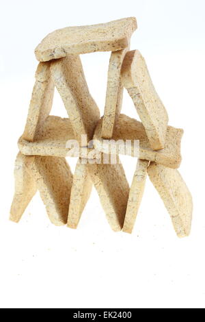 Pyramid of biscuits on a white background Stock Photo - Alamy