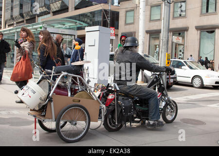 man riding mini motorcycle Stock Photo - Alamy