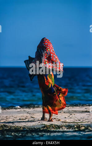 AFRICA KENYA MALINDI Kenyan woman dressed in traditional kanga cloth ...