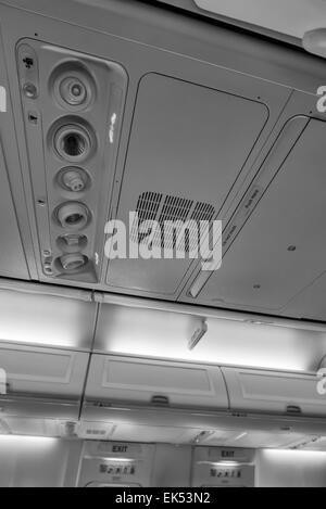 Italy, airplane cabin, emergency exit lights Stock Photo - Alamy
