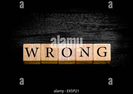 Word WRONG. Wooden small cubes with letters isolated on white ...
