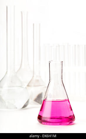variety of glass flasks with reagents on a light background Stock Photo ...