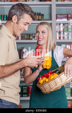 Customer asking for help to a employee Stock Photo - Alamy