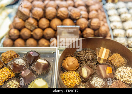 Window display in chocolate shop Bruges Belgium. Boxes shaped like ...