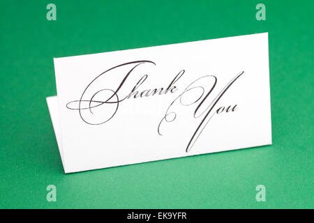 card signed thank you on green background Stock Photo - Alamy