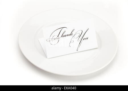 plate with card signed thank you isolated on white Stock Photo - Alamy