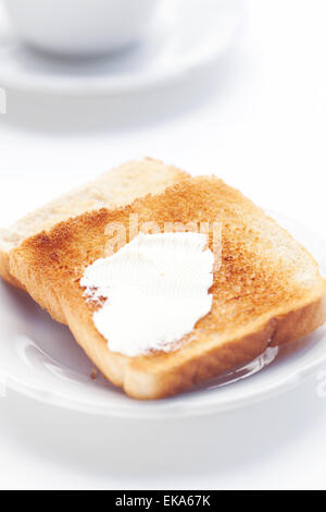 tea and toast with butter isolated on white Stock Photo - Alamy