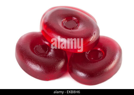 Red candies isolated on a white background Stock Photo - Alamy