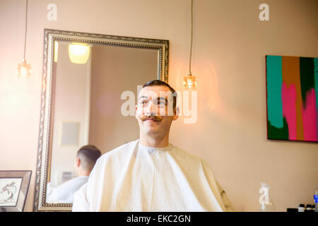 Young man in beauty salon Stock Photo - Alamy