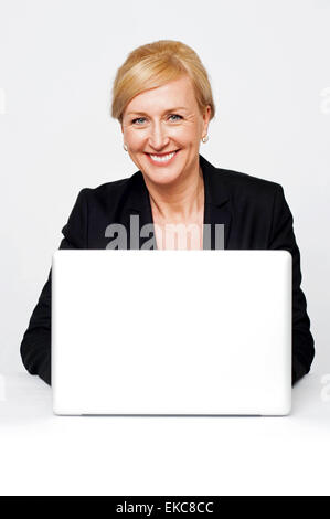 Working lady with laptop isolated on white Stock Photo - Alamy