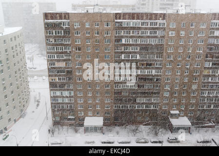 Snowfall on a residential building facade background. Winter mood Stock ...